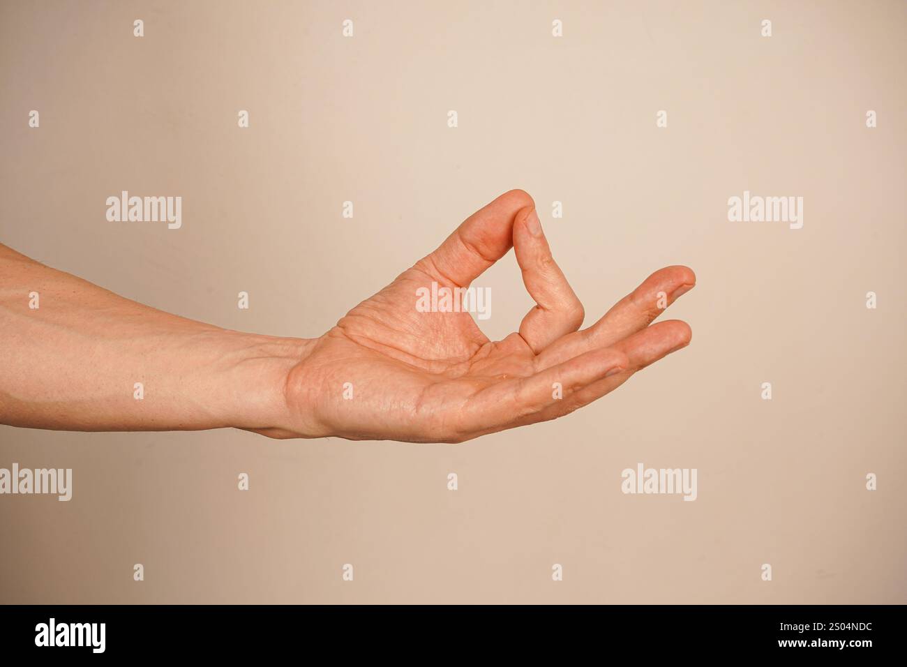 Human hand making an "okay" gesture, palm up. Clean, minimalist ...
