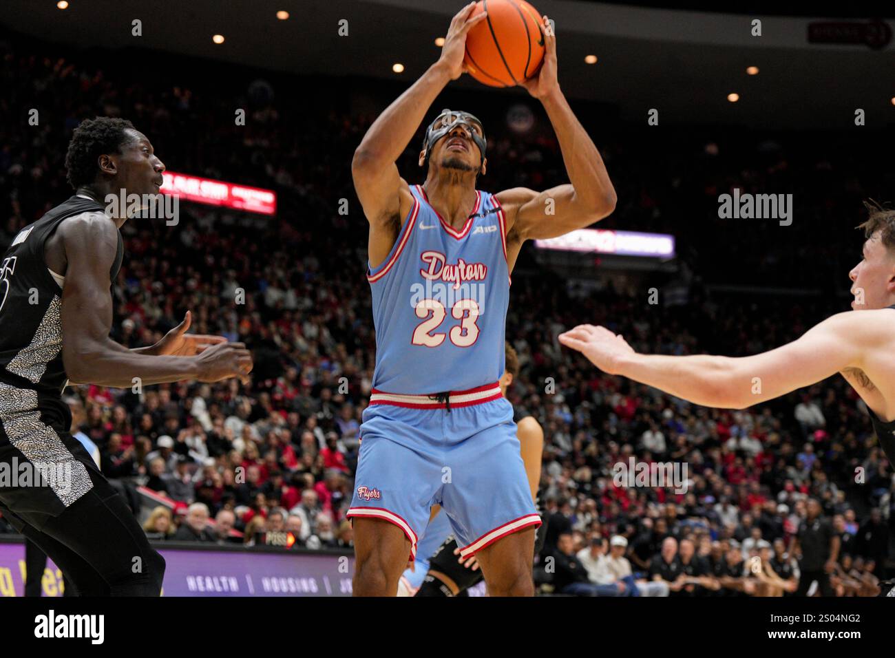 Dayton forward Zed Key (23) shoots against Cincinnati forward Aziz ...