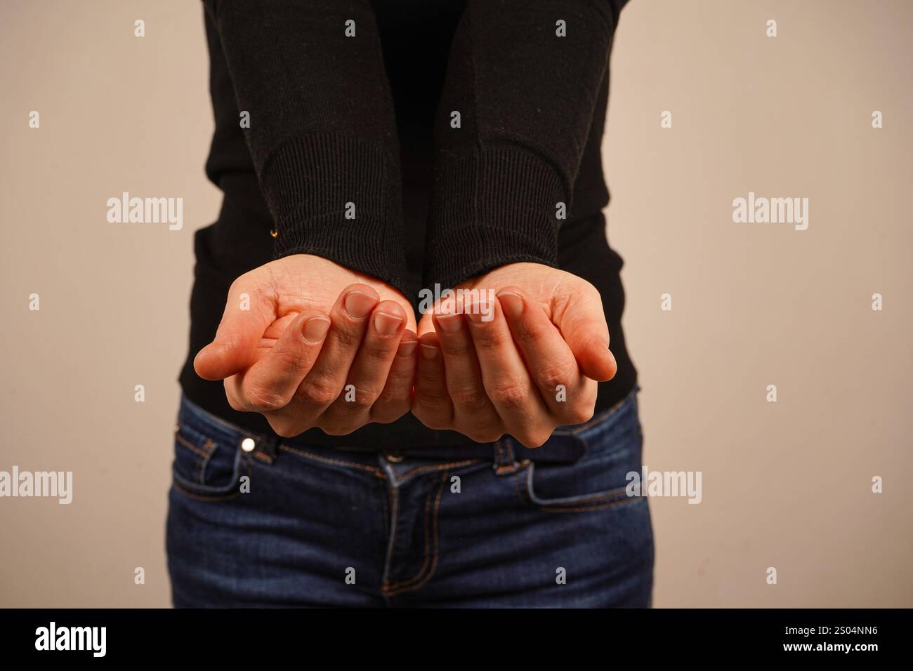 The palms are brought together in a pose of balance and unity ...