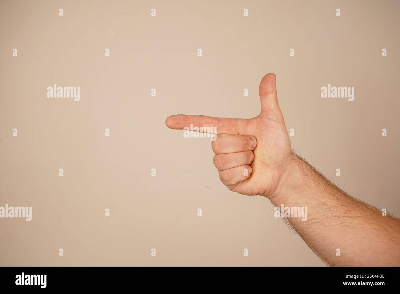 The index finger points forward with intent, drawing attention to ...