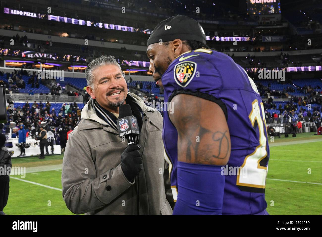 NFL Network reporter Omar Ruiz interviews Baltimore Ravens running back ...