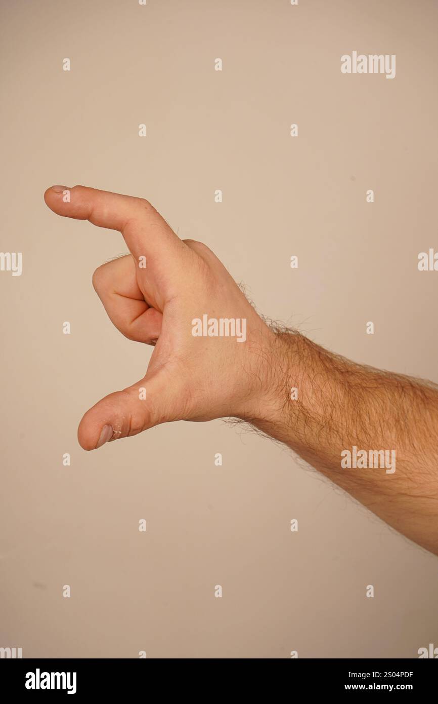 Hand gesture where thumb and index finger form a small gap. Concept ...