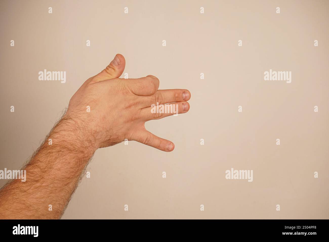 The hand gesture mimics the open mouth of a dog, combining whimsy and ...