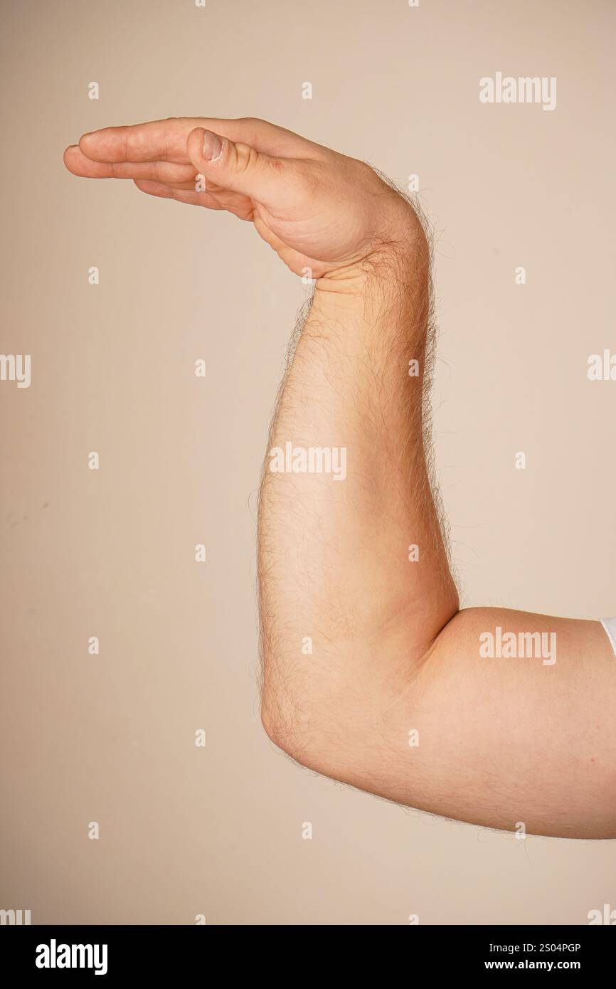 The hand is bent at the elbow and wrist. The gesture imitates a snake ...