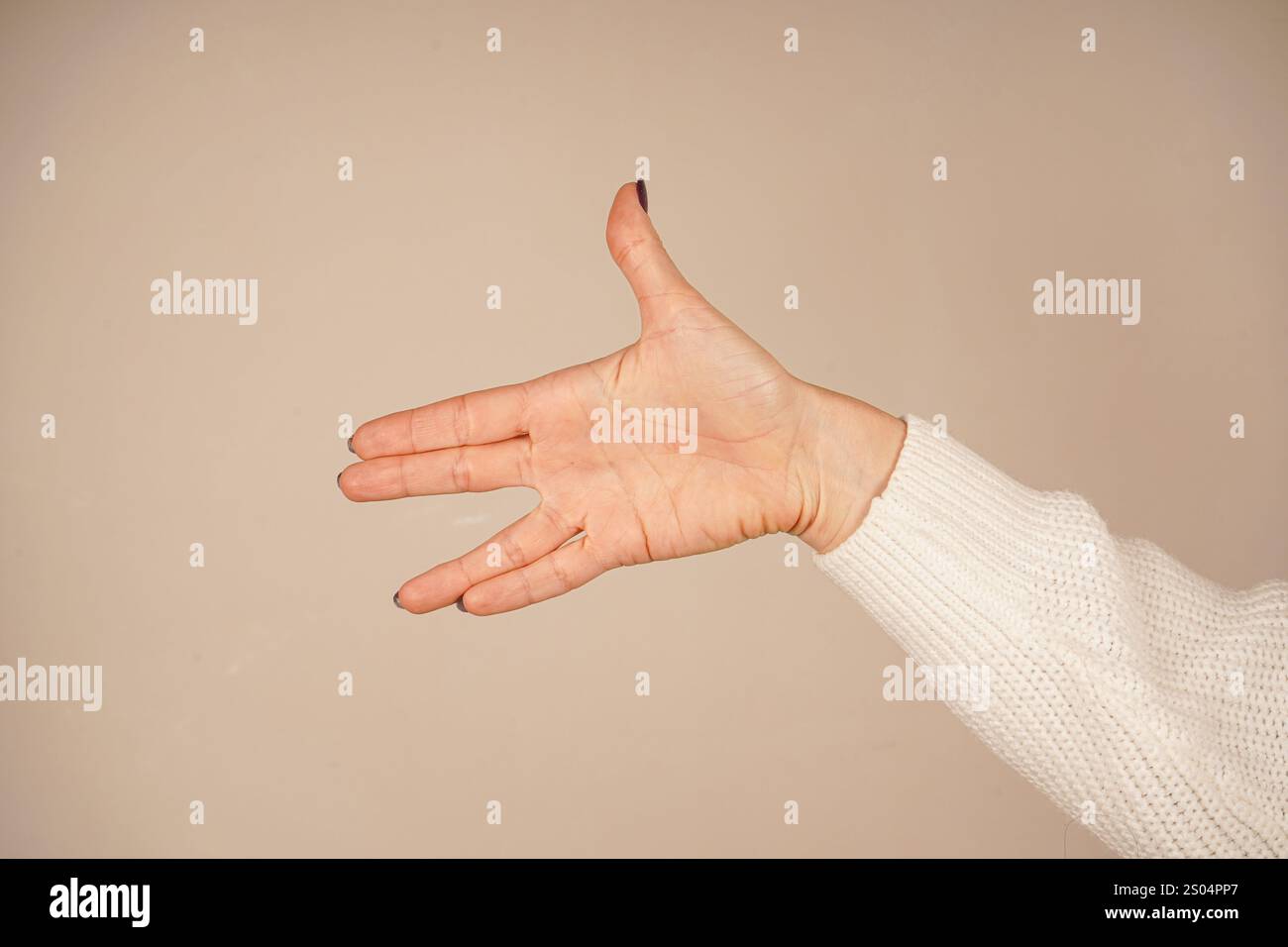 The fingers are spread out in pairs, creating a playful and creative ...