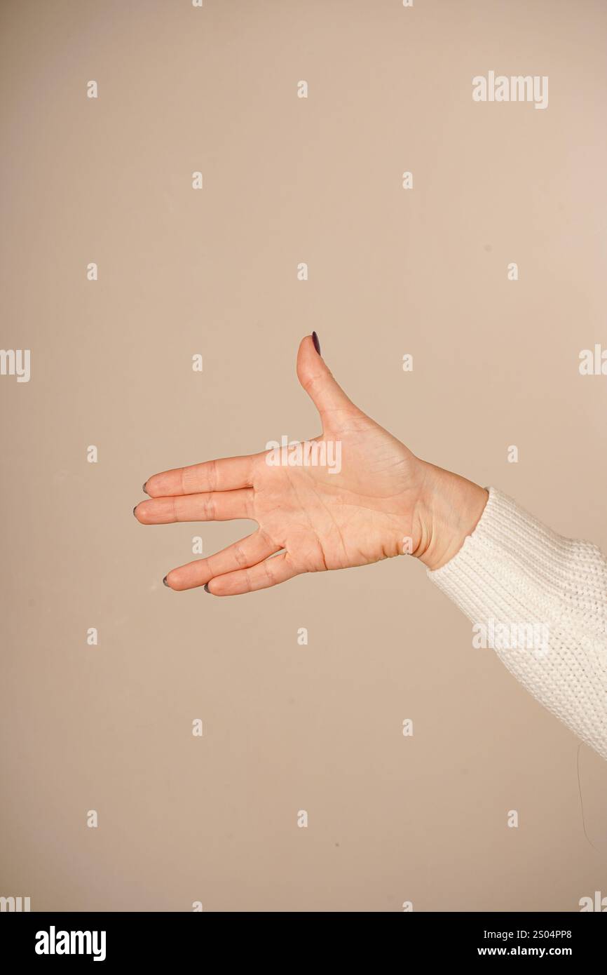 The fingers are spread out in pairs, creating a playful and creative ...