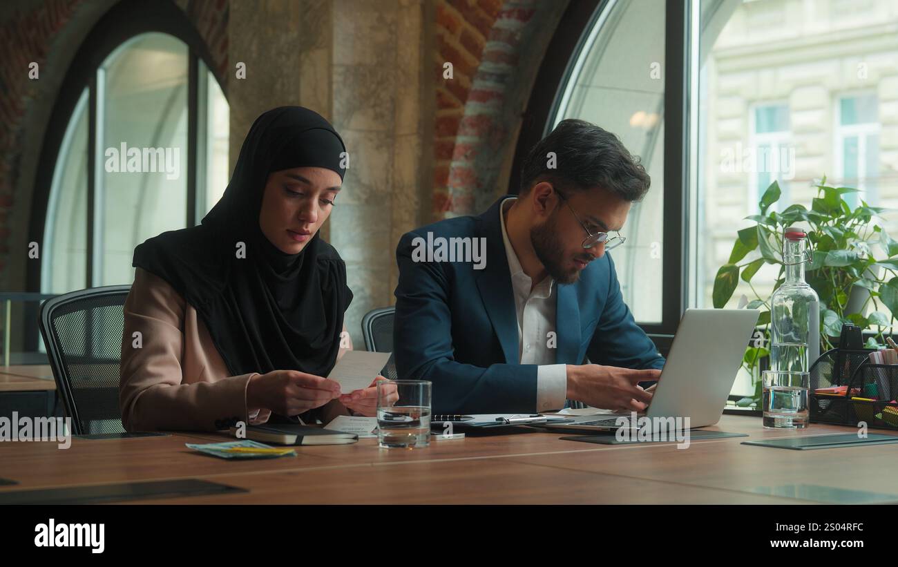 Male female teamwork Arabian man muslim woman in hijab girl guy ...