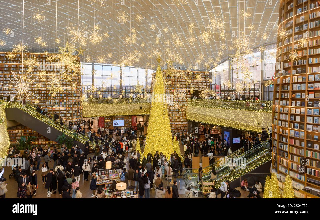 People are visiting one of Seoul's tourist attractions, the huge golden ...
