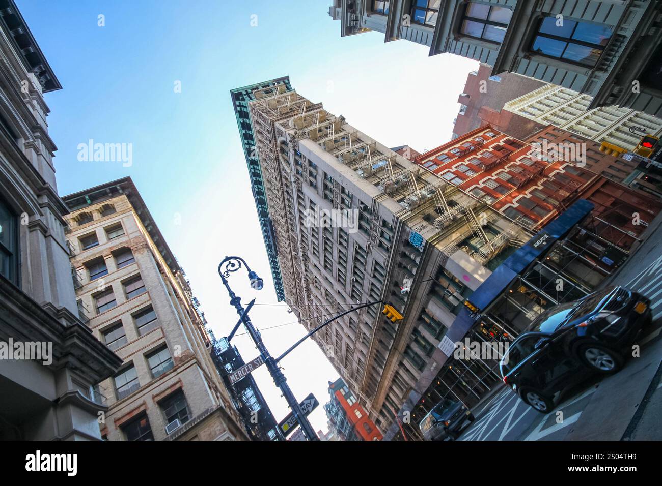 looking up Unique angle of iconic old new york city urban architecture ...