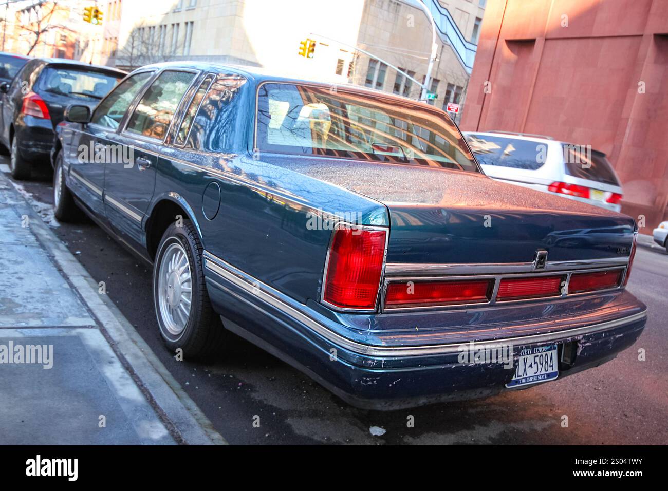blue vintage 1990s lincoln town car parked in manhattan street new york ...