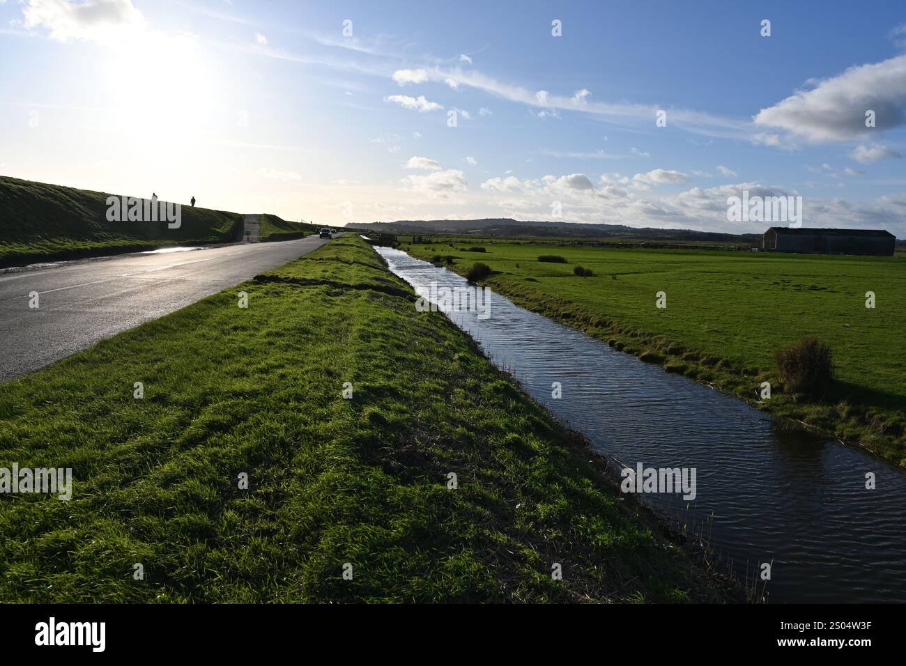 stretching straight road flowing into the distant horizon Stock Photo ...