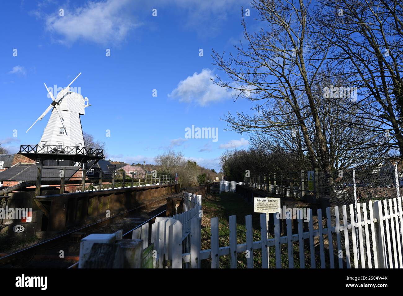 beautiful white windmill landscape photo Stock Photo - Alamy