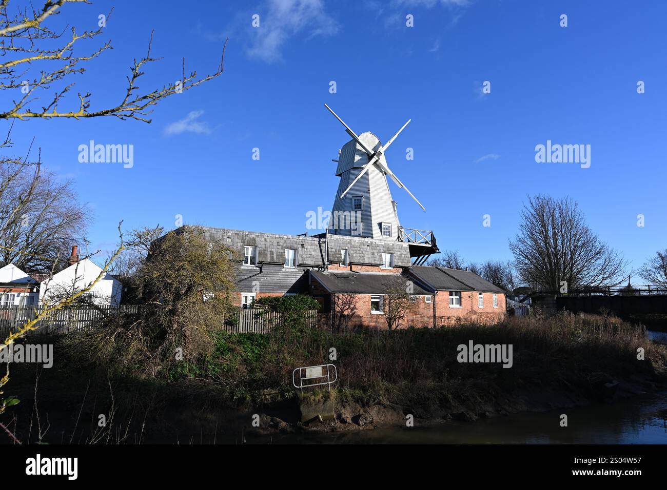 beautiful white windmill landscape photo Stock Photo - Alamy