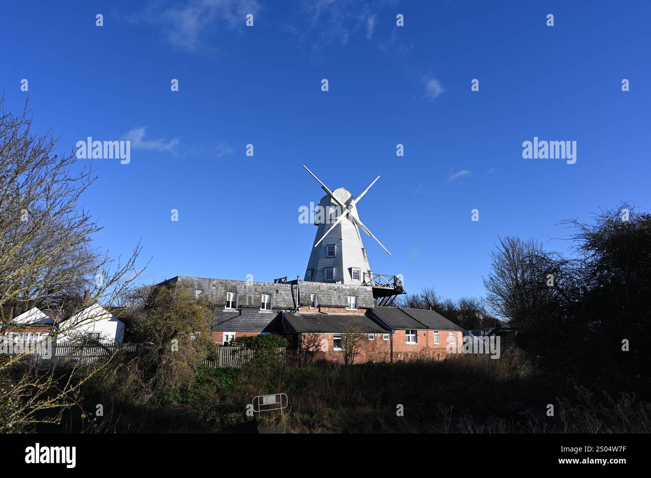 beautiful white windmill landscape photo Stock Photo - Alamy