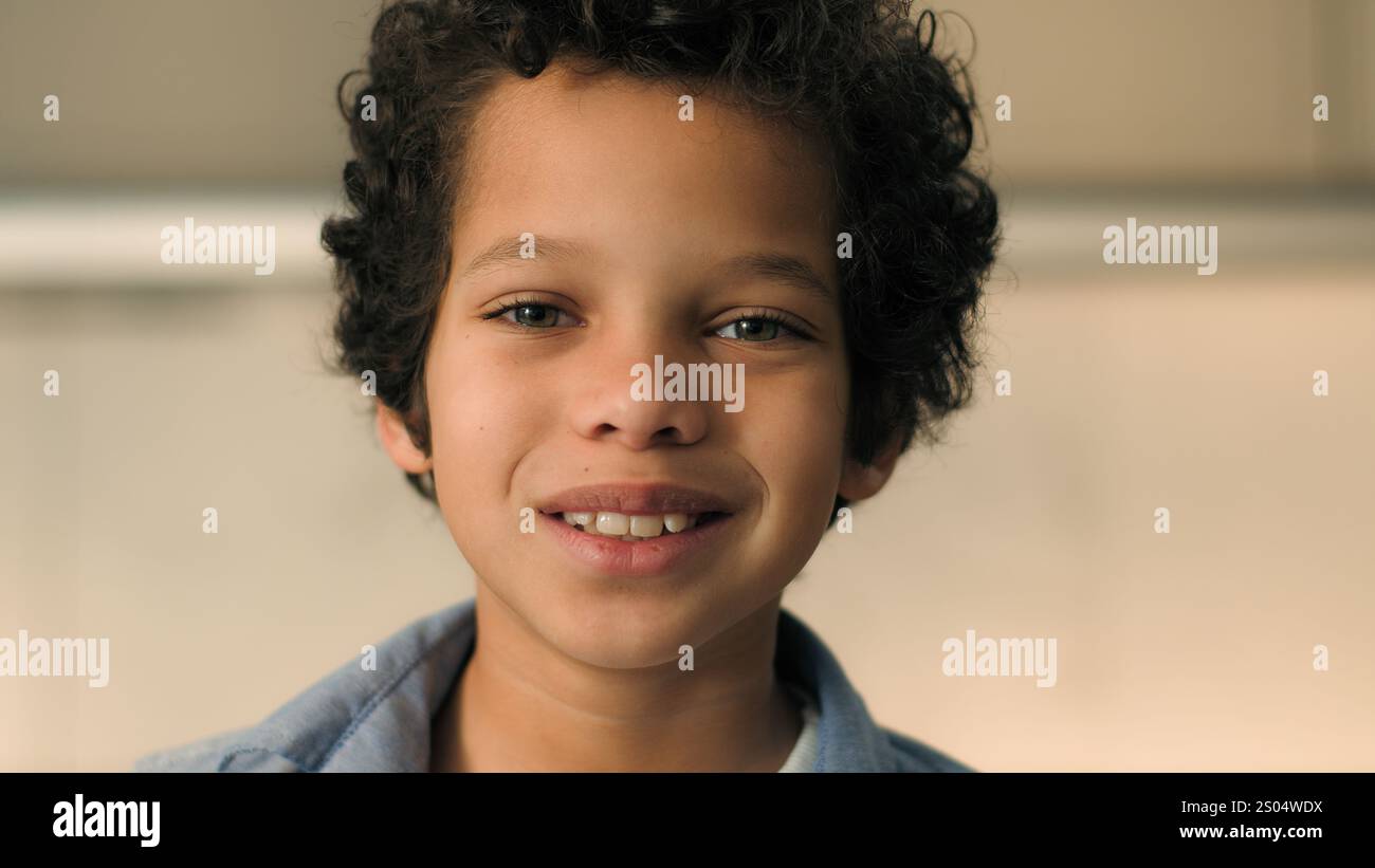 Close up portrait little boy African American ethnic child son male ...