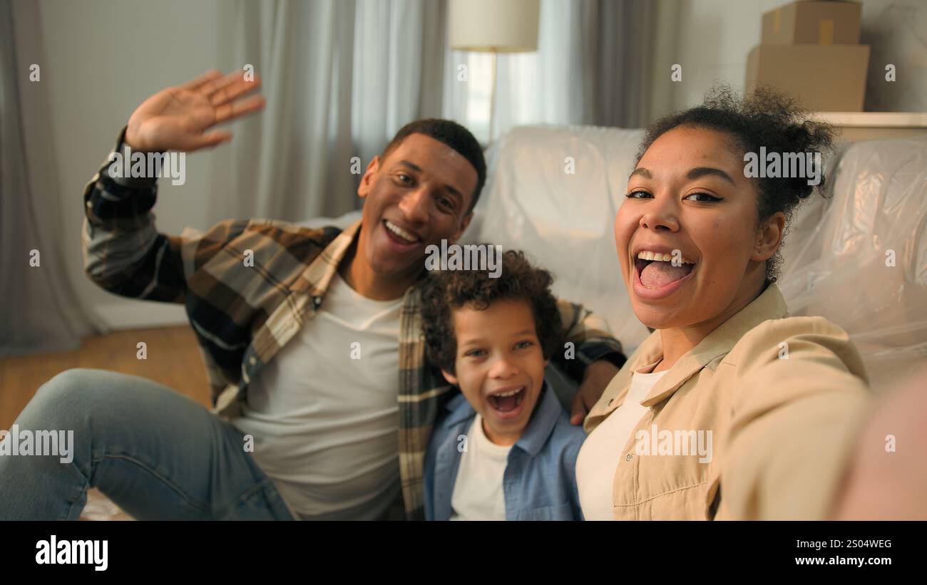 Happy cheerful African American family funny joyful parents mom dad ...