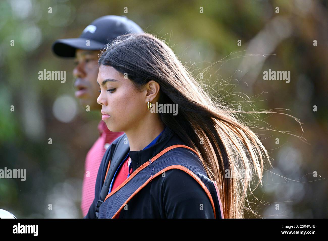 Tiger Woods and his daughter Sam Woods walk on the 15th hole during the ...