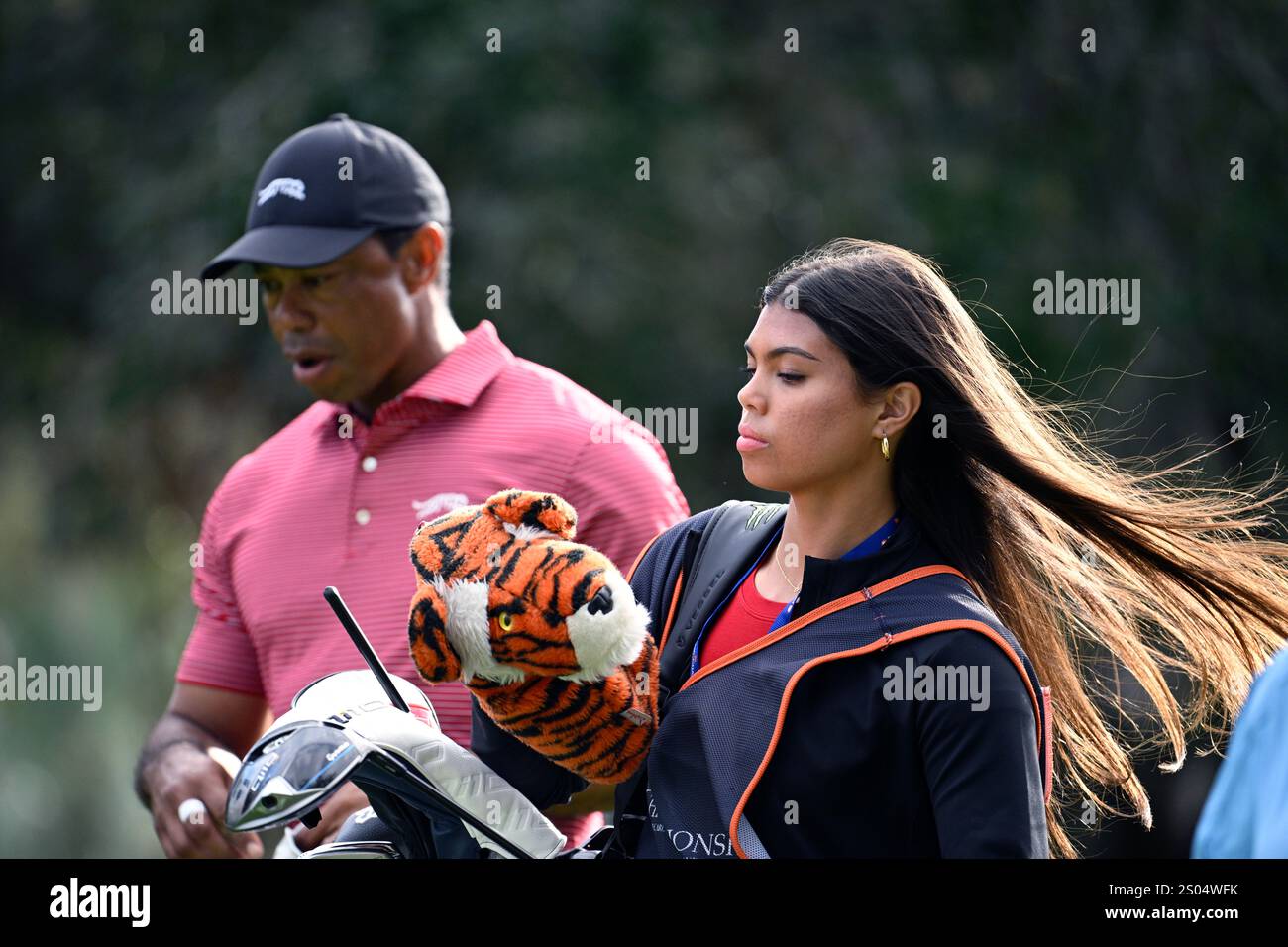 Tiger Woods and his daughter Sam Woods walk on the 15th hole during the ...