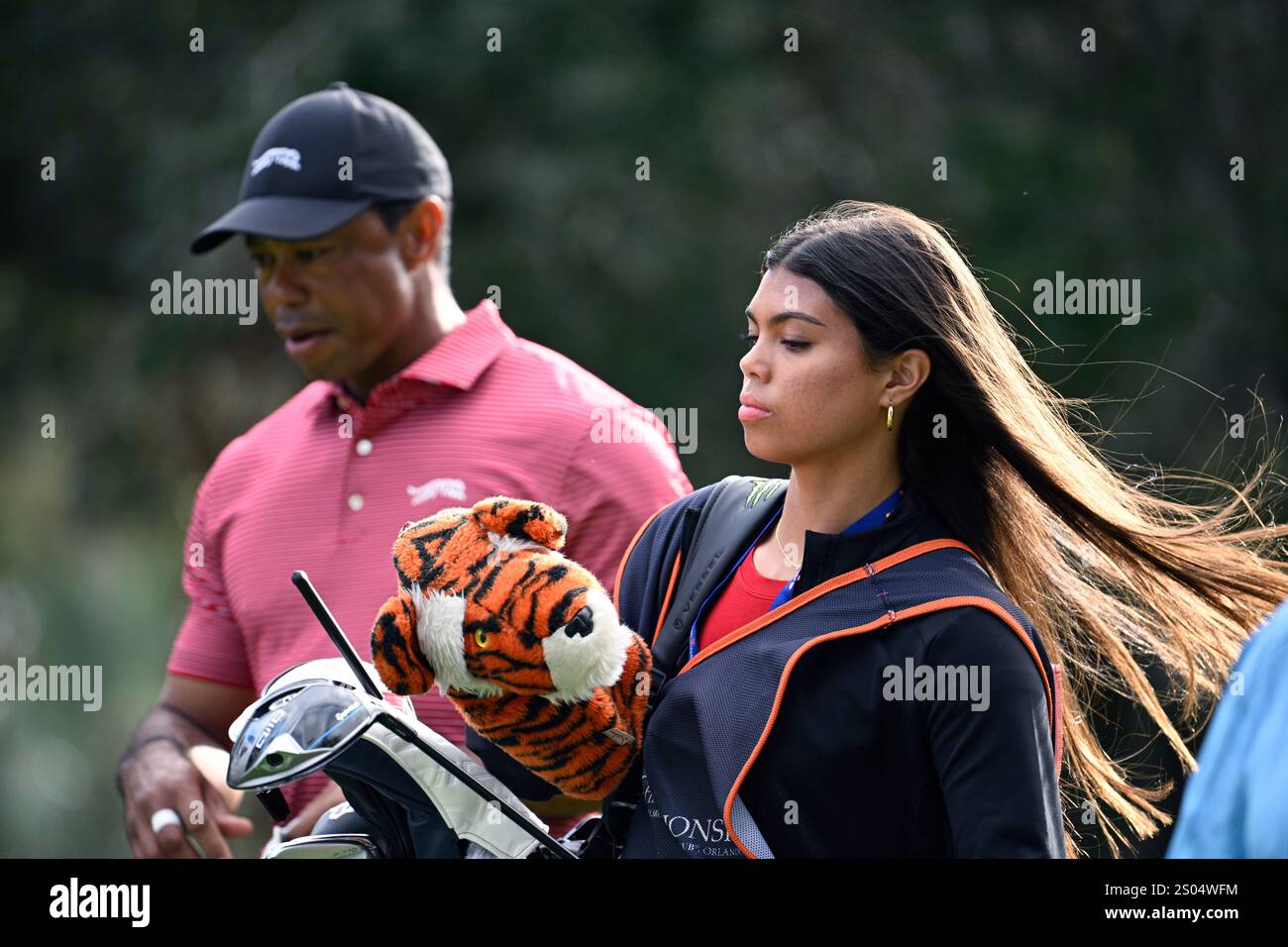 Tiger Woods and his daughter Sam Woods walk on the 15th hole during the ...