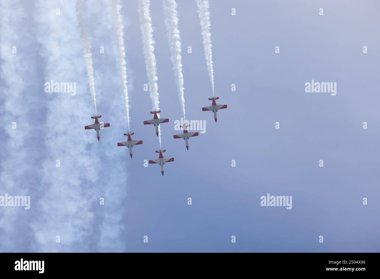 The Patrulla Águila, Spain's aerobatic team, performs a synchronized ...