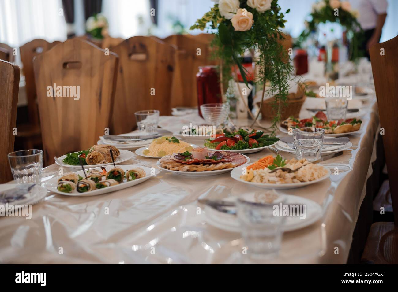 Elegant Feast Set on a Long Banquet Table with an Array of Dishes Stock Photo - Alamy
