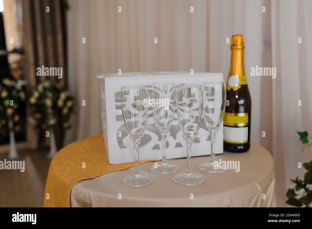 Elegant Celebration Setup with Champagne and Flutes Stock Photo - Alamy