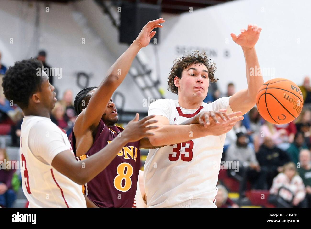 December 22, 2024: Colgate Raiders forward Sam Wright (33) and Iona ...
