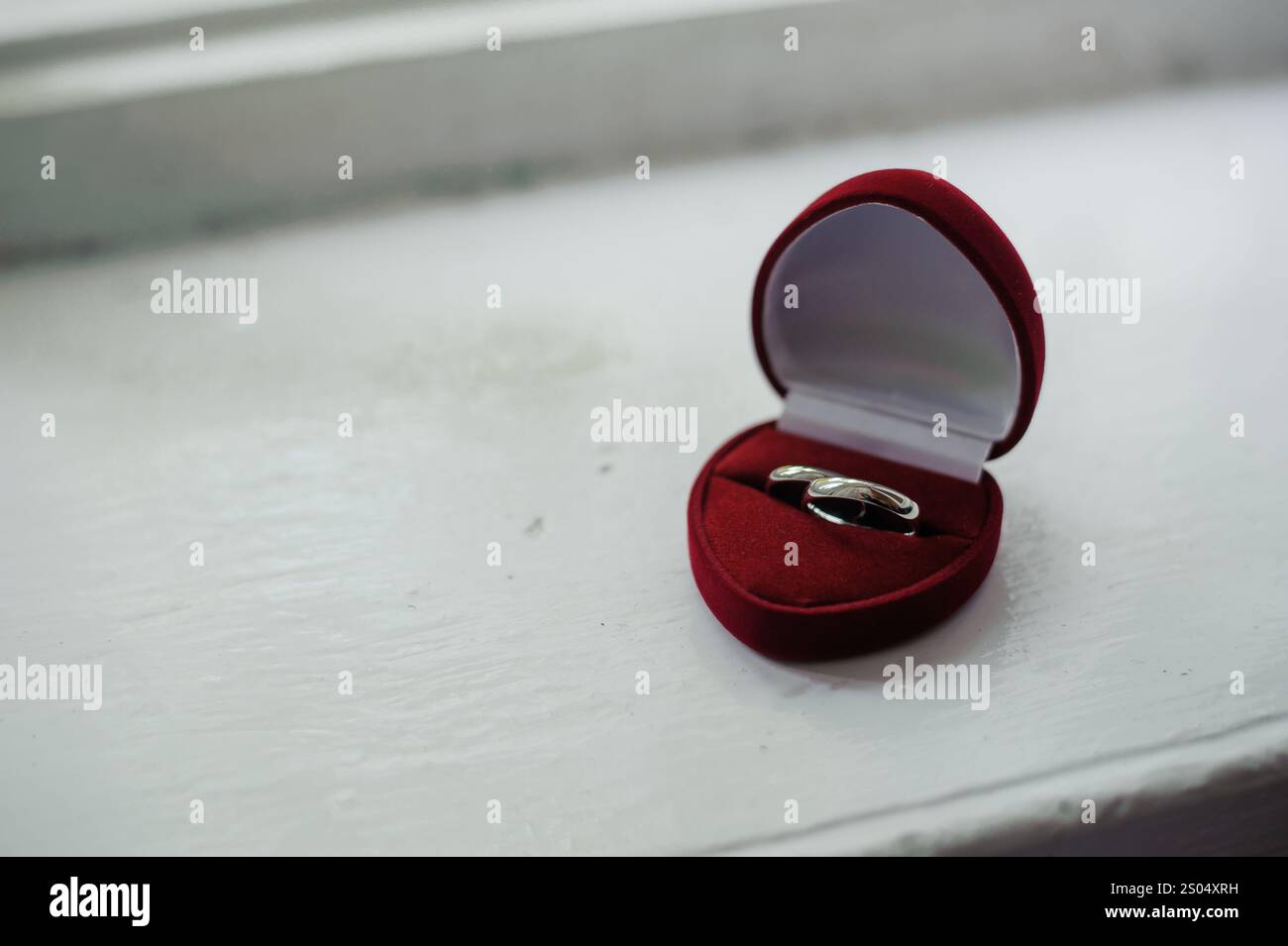 Elegant Silver Ring in a Red Velvet Display Box Stock Photo - Alamy