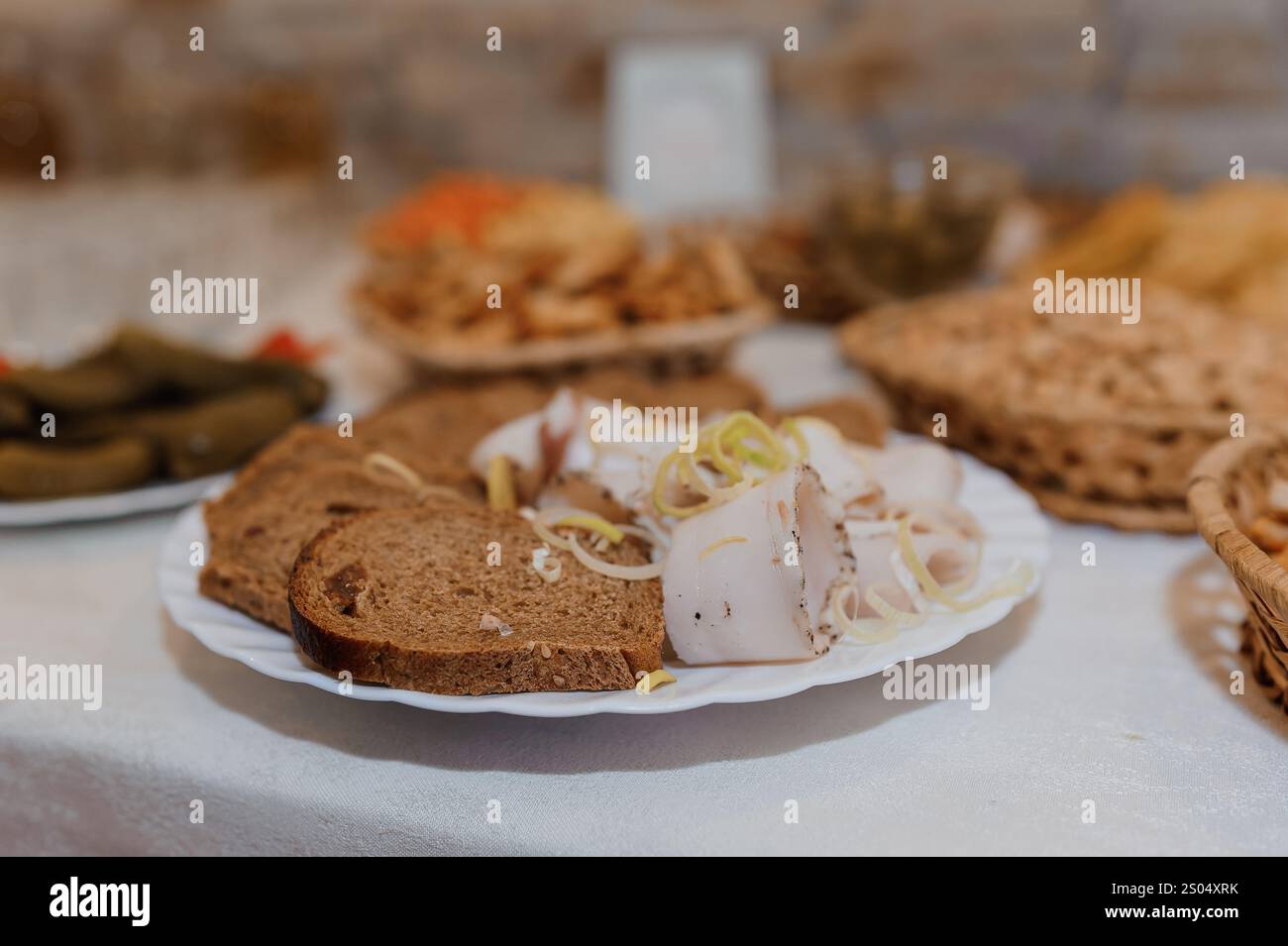 Traditional Appetizer Platter Featuring Slices of Cured Meat and Rye ...