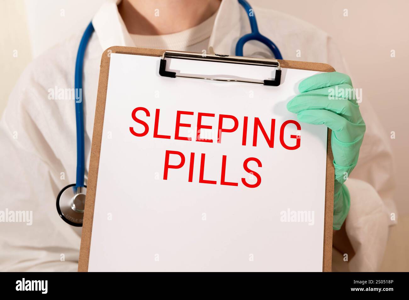 SLEEPING PILLS text on a letterhead in a medical folder on a beautiful ...