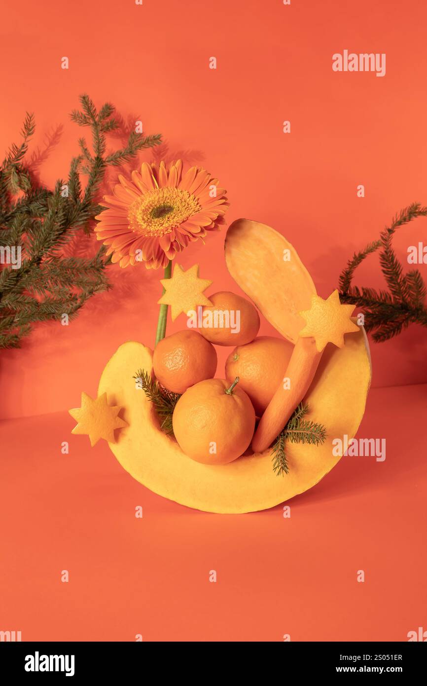 Orange still life made of fruit and flower Stock Photo - Alamy