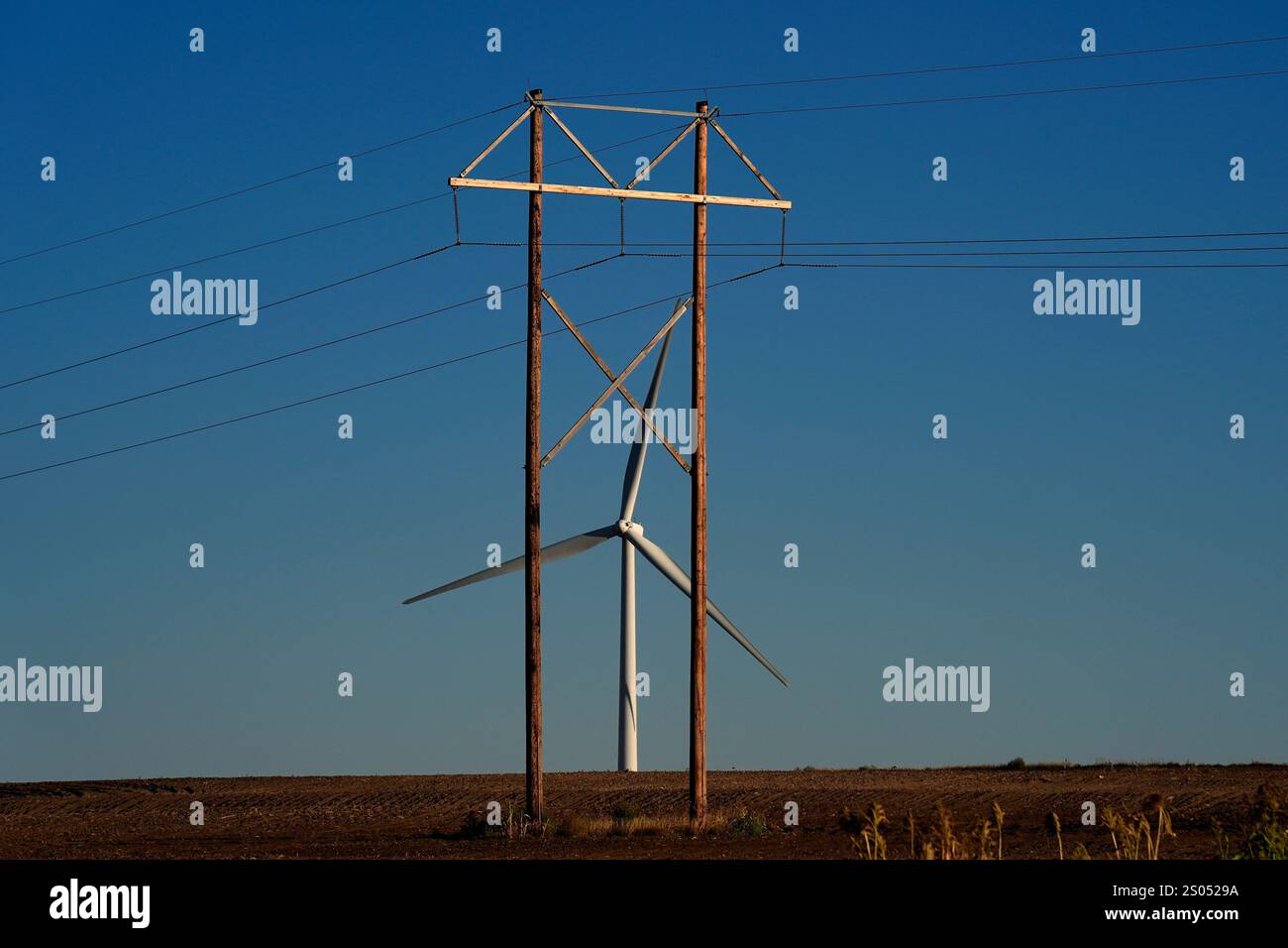 A wind turbine at the Buckeye Wind Energy rises beyond electrical ...
