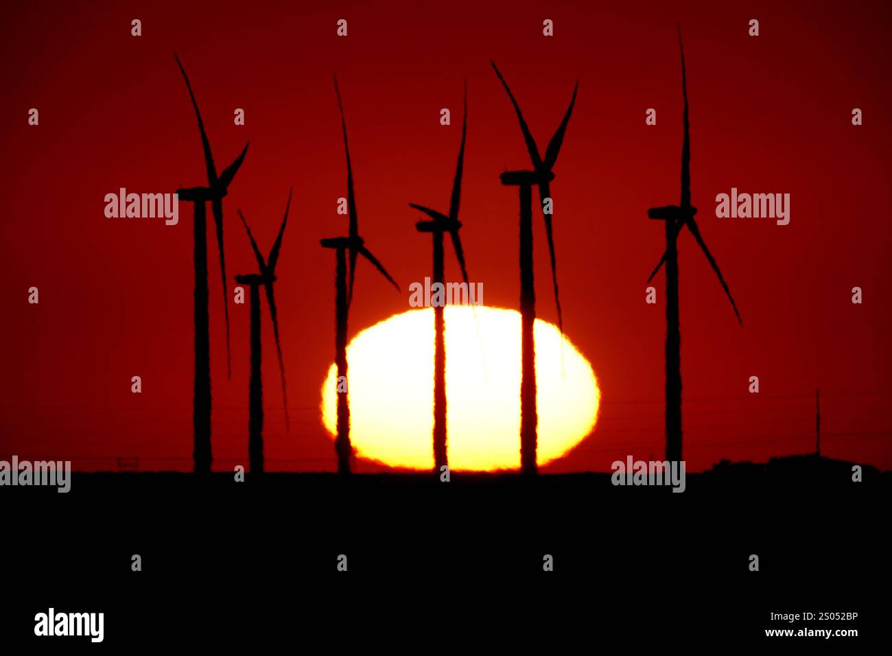 Wind turbines at the Buckeye Wind Energy are diffused by heat vapors as ...