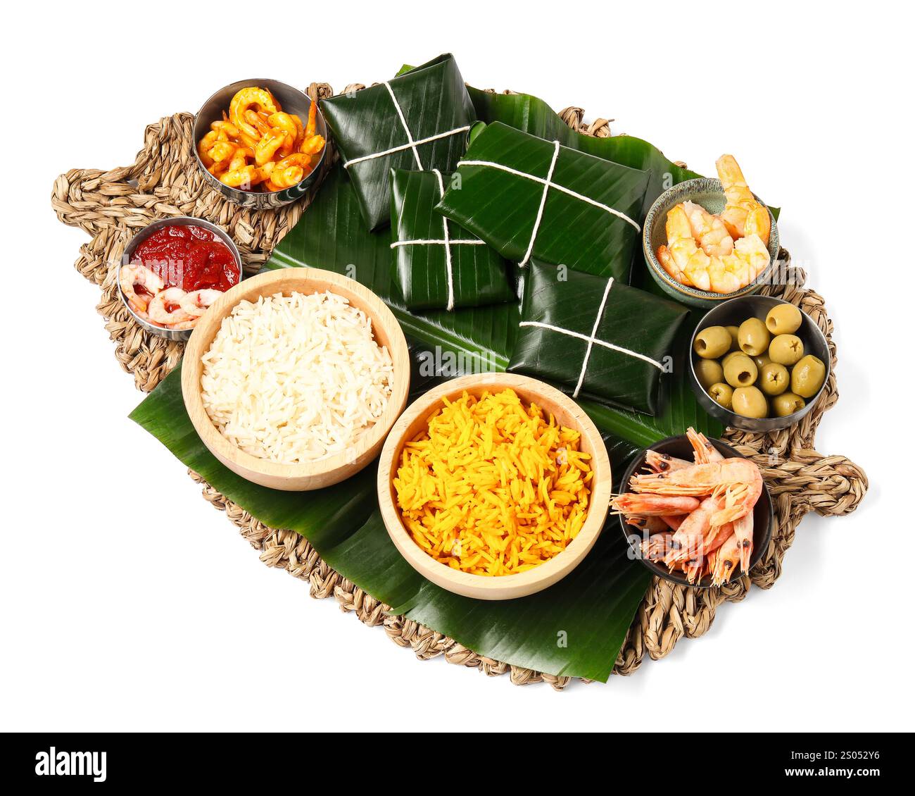 Cut banana leaves with different food isolated on white, top view ...