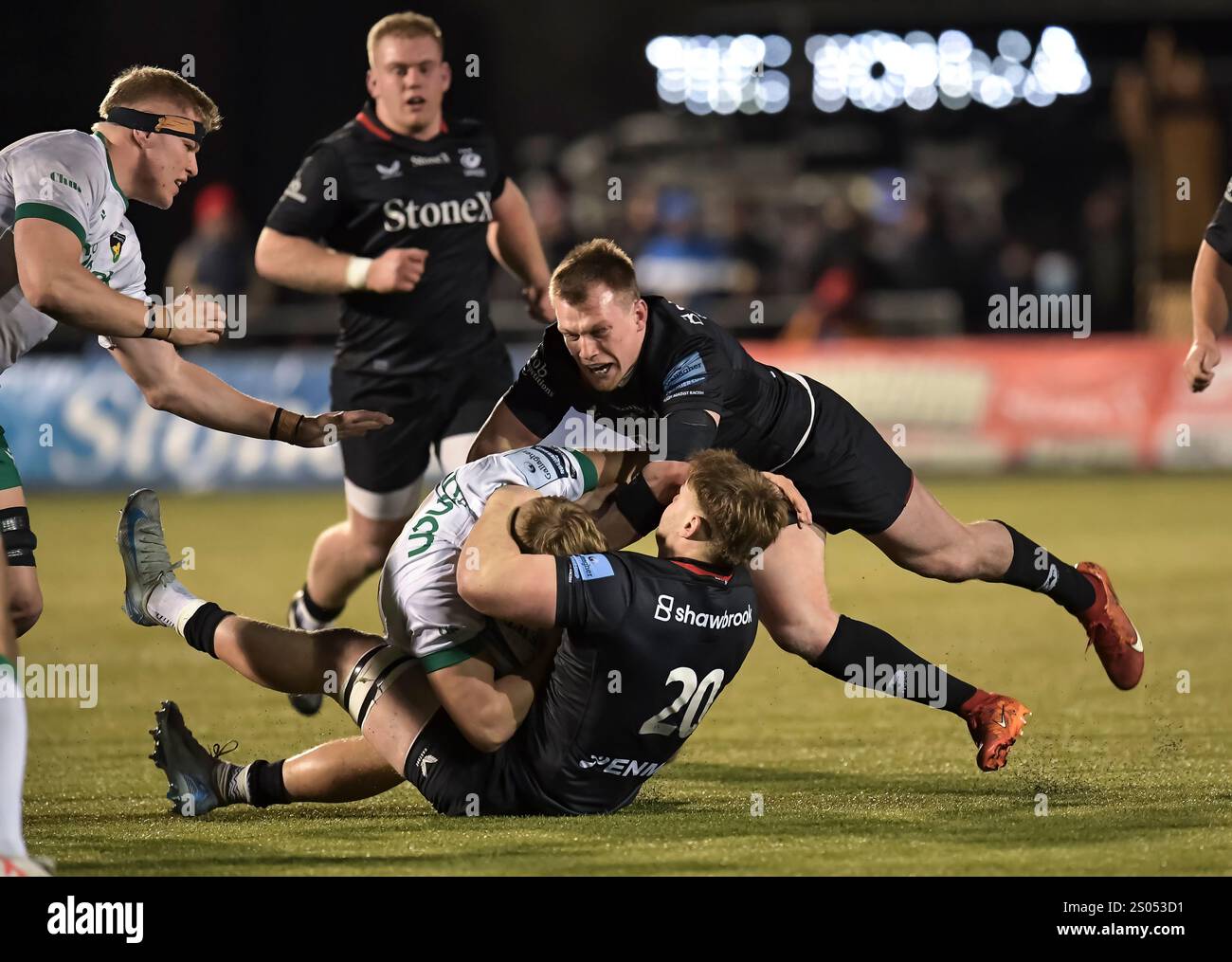 Nick Tompkins and Toby Knight of Saracens and Henry Pollock of ...