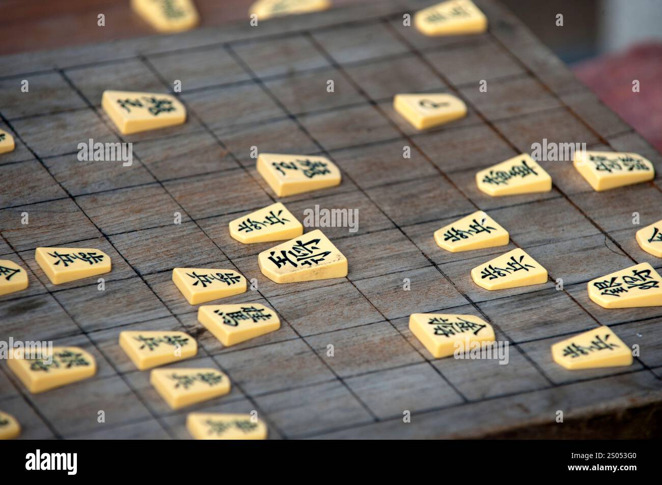 A strategy board game called shogi, or Japanese chess, as seen in a ...