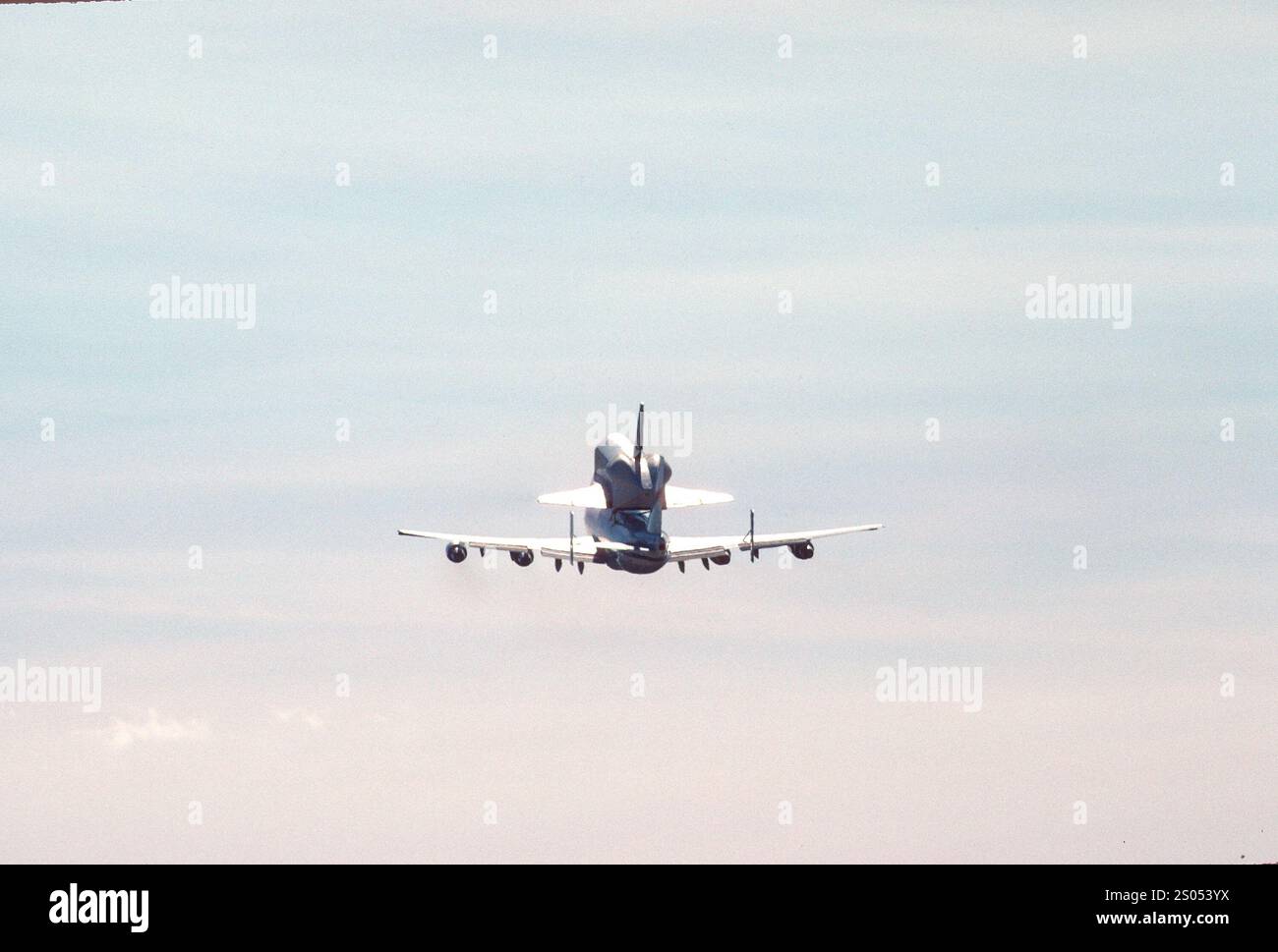 Space Shuttle Challenger ferry flight climbing after takeoff at Davis ...