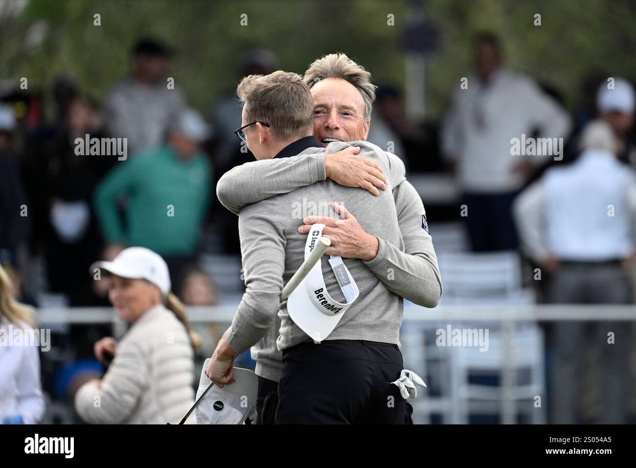 Bernhard Langer, right, hugs his son Jason Langer after winning the PNC ...