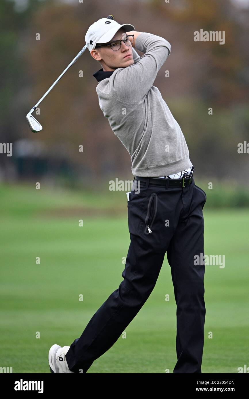 Jason Langer hits from the 18th fairway during the final round of the ...
