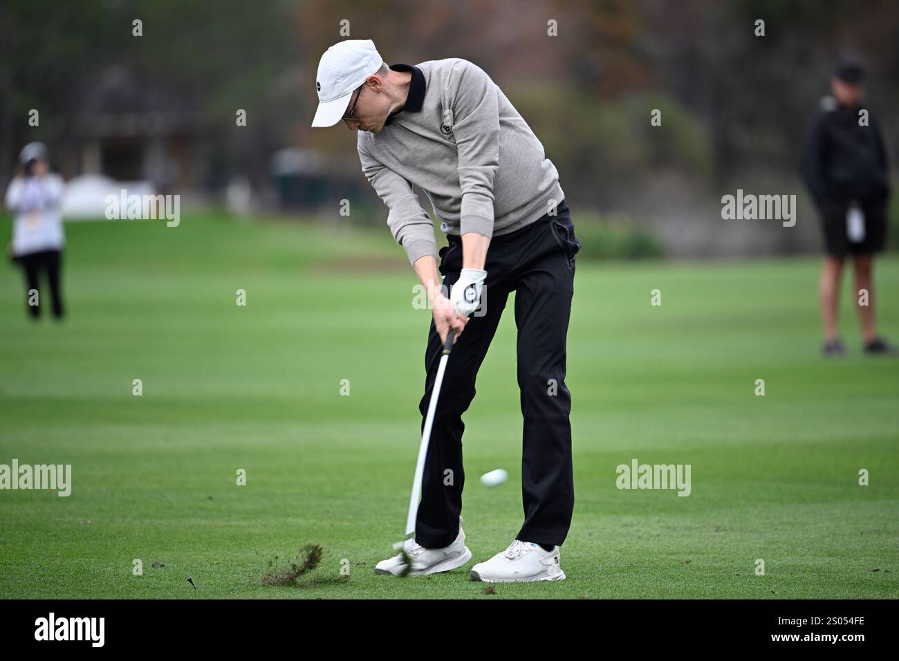 Jason Langer hits from the 18th fairway during the final round of the ...