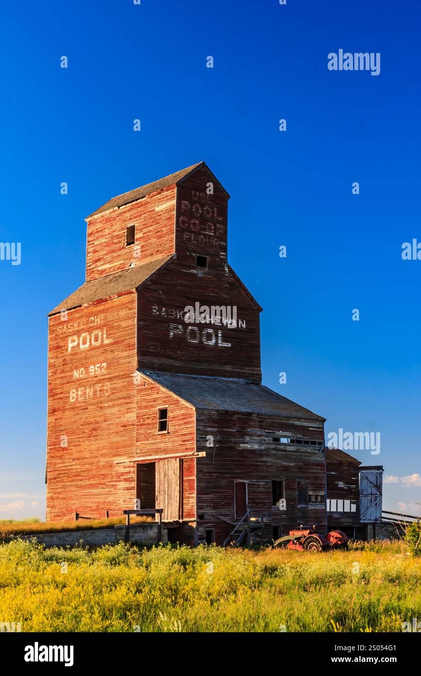 A red barn with a sign that says Pool on it. The barn is old and has a ...