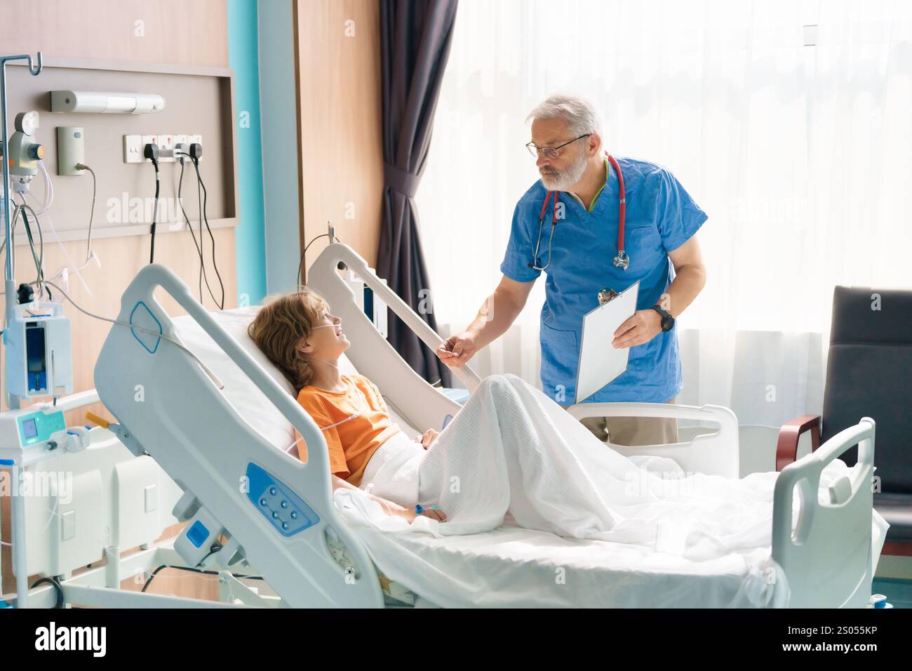 Sick child in hospital room. Kid in clinic ward. Little boy with oxygen ...