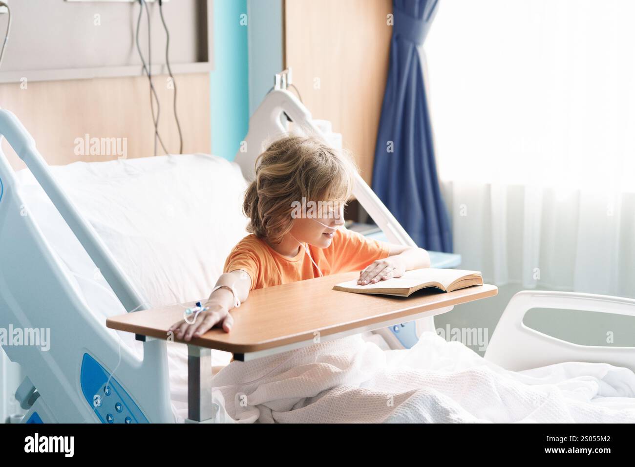 Sick child in hospital room. Kid in clinic ward. Little boy with oxygen ...