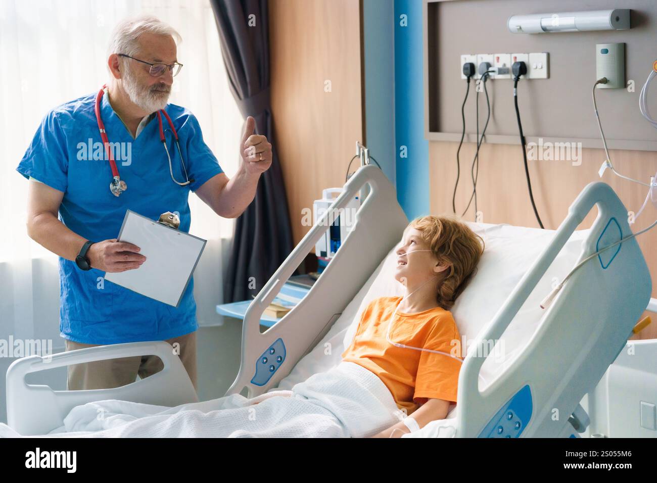 Sick child in hospital room. Kid in clinic ward. Little boy with oxygen ...