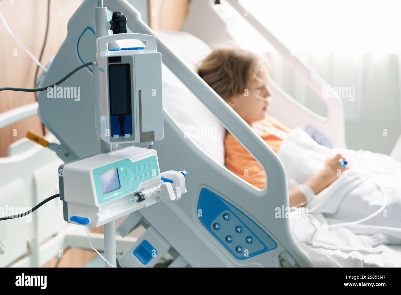 Sick child in hospital room. Kid in clinic ward. Little boy with oxygen ...