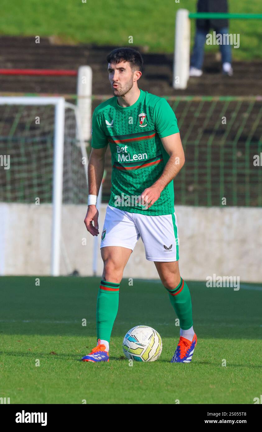 Footballer in action Glentoran football player Danny Amos Stock Photo ...