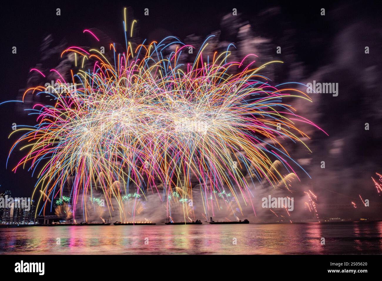 Bright beautiful colorful fireworks celebration in the night sky. Photo ...