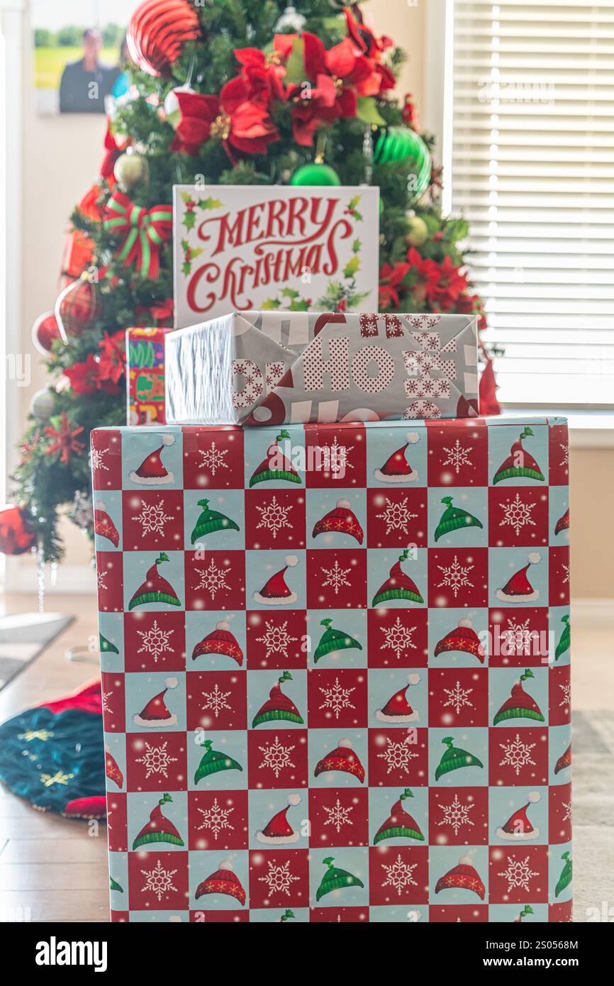 collection of Christmas gifts wrapped under Christmas tree Stock Photo ...