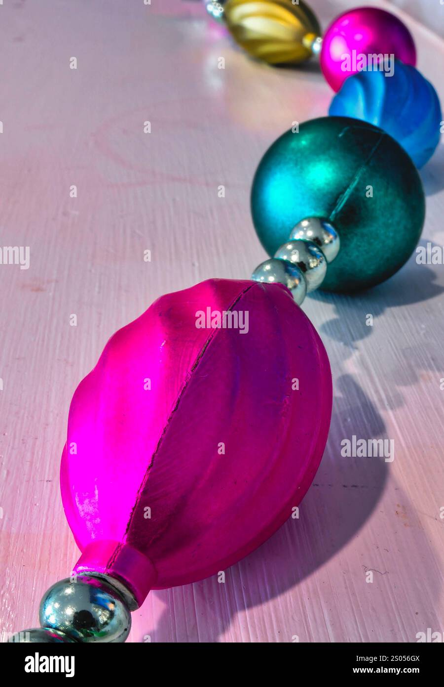 A string of Christmas ornaments Stock Photo - Alamy