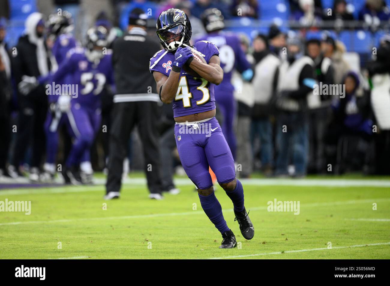 Baltimore Ravens running back Justice Hill (43) works out before an NFL ...